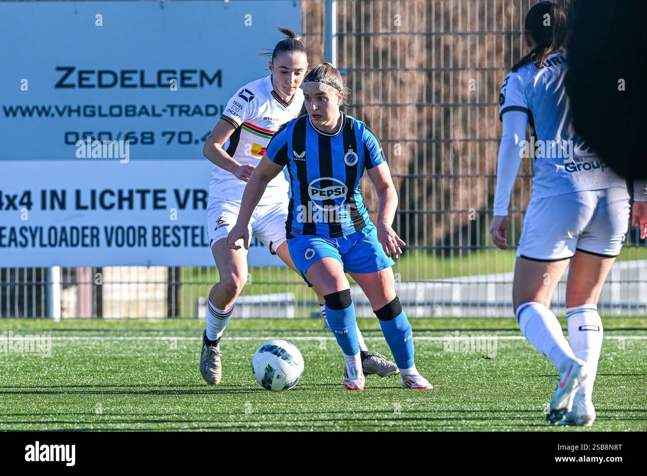 Aalter, Belgium. 1st Feb 2025. Davinia Vanmechelen (25) of Club YLA and Zenia Mertens (6) of OHL ...