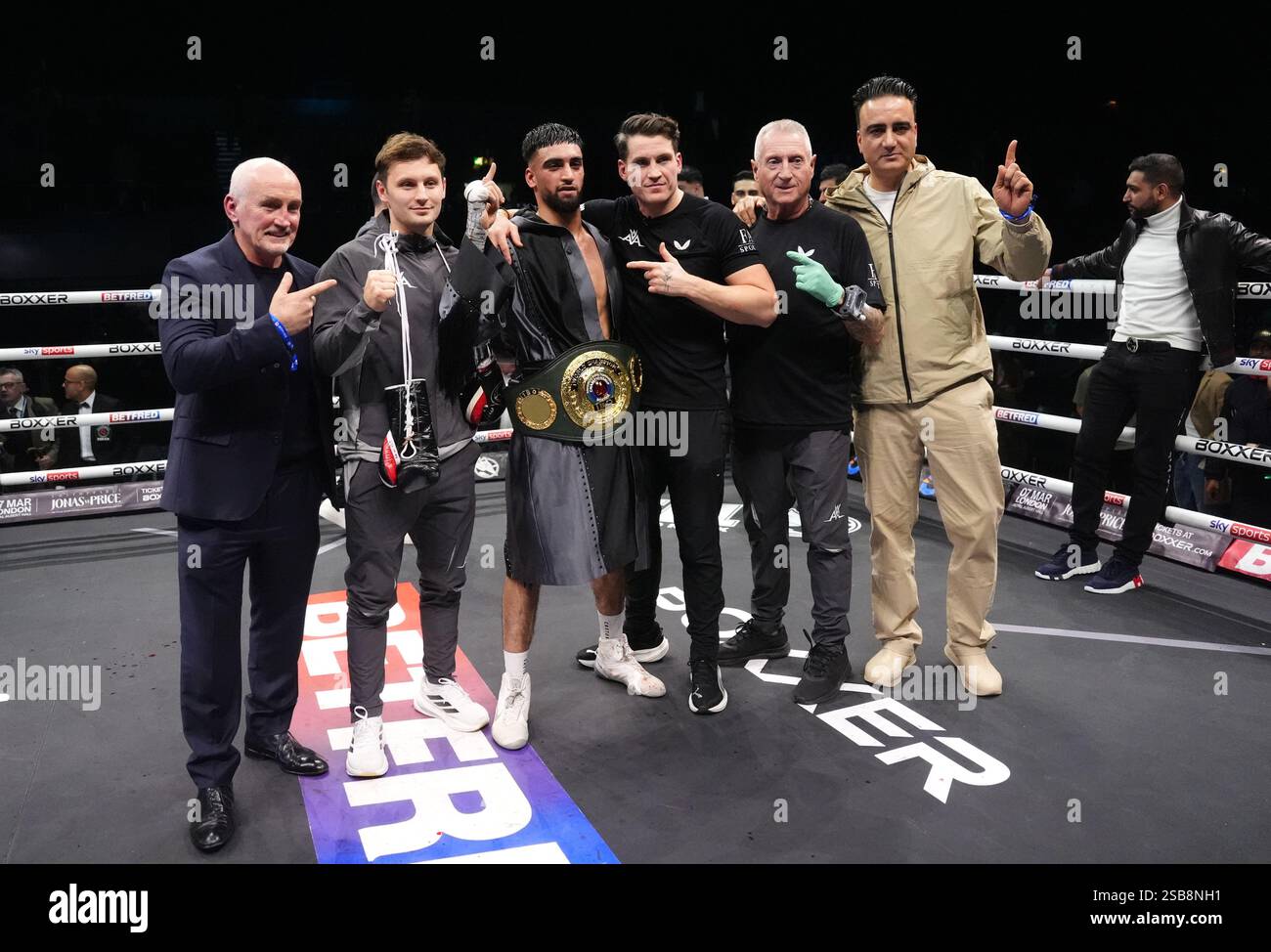 Adam Azim and his team celebrate victory against Sergey Lipinets (not ...