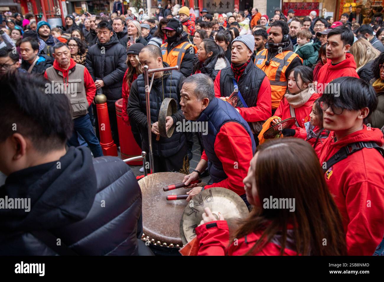 A traditional Chinese band plays in Chinatown. Tens of thousands of ...