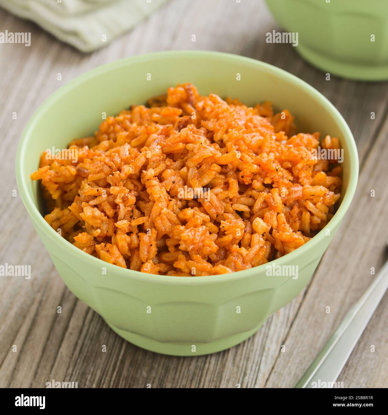 Homemade Mexican red rice or Arroz rojo made with onion, garlic and ...