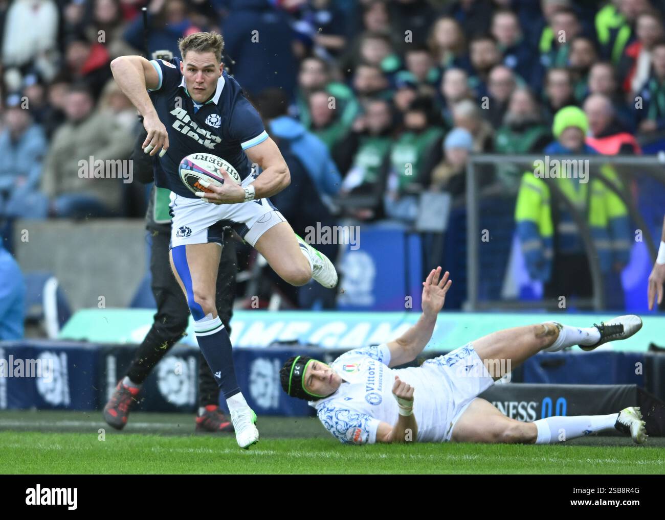 Edinburgh, UK. 1st Feb, 2025. Duhan van der Merwe of Scotland and Juan ...