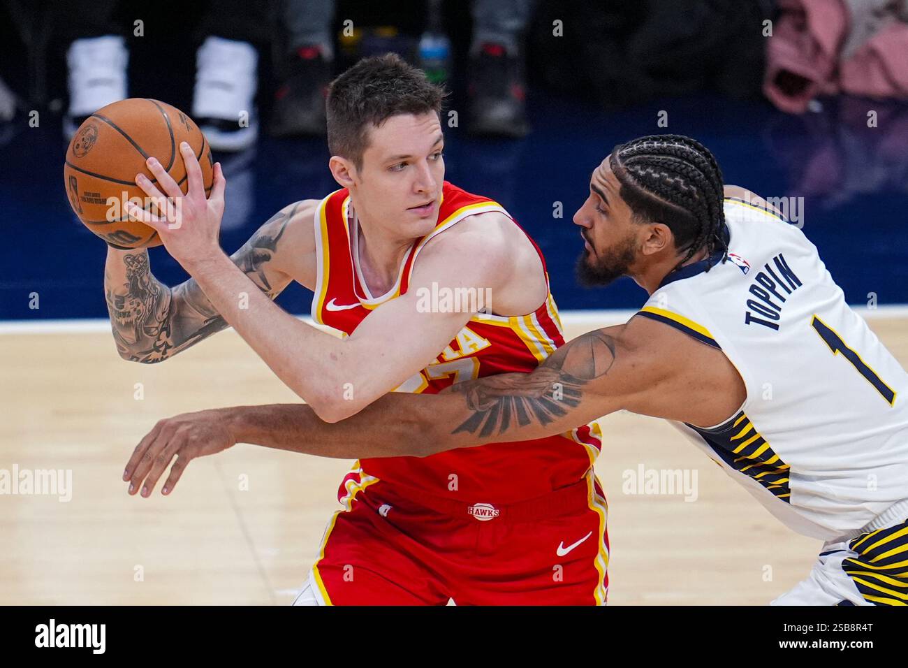 Indiana Pacers forward Obi Toppin (1) defends Atlanta Hawks guard Vit ...