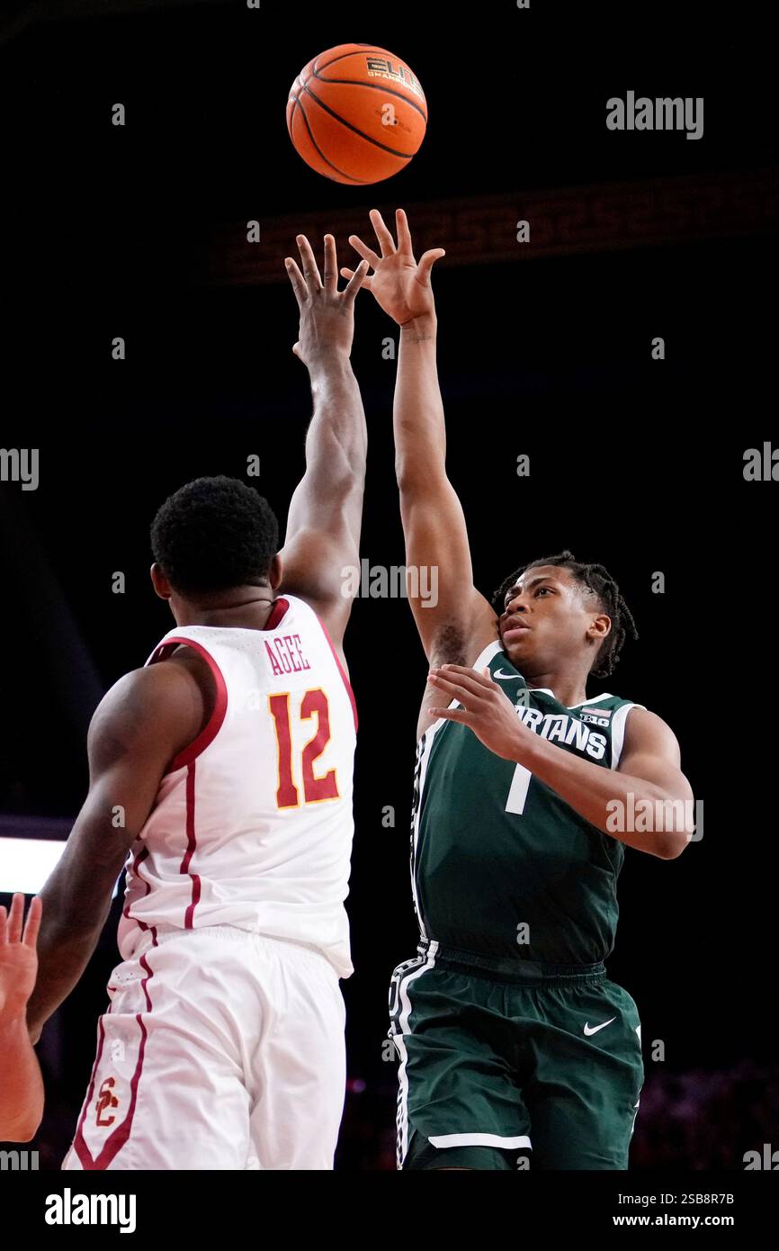 Michigan State guard Jeremy Fears Jr., right, shoots as Southern ...