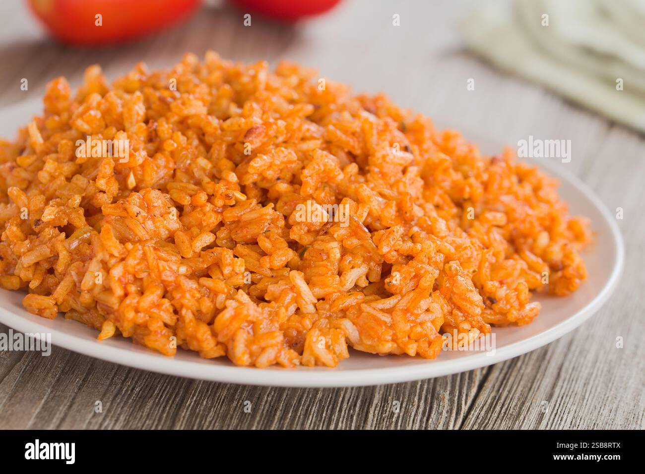 Homemade Mexican red rice or Arroz rojo made with onion, garlic and ...