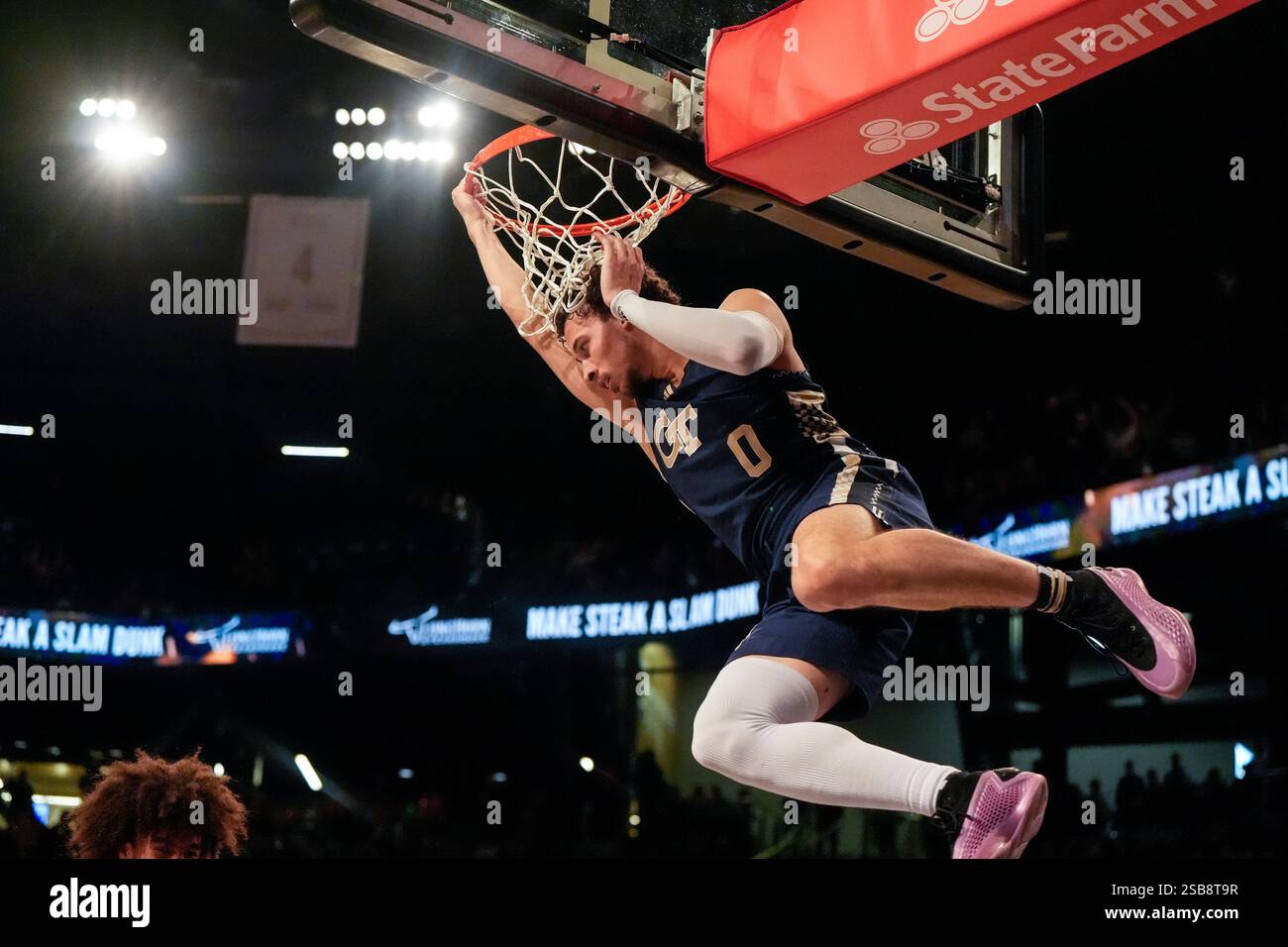 Georgia Tech guard Lance Terry (0) dunks the ball against Louisville ...