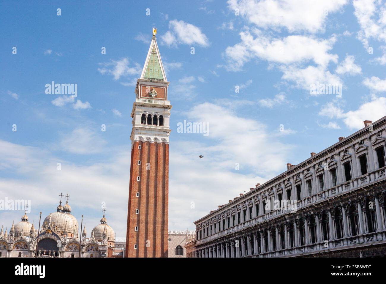 St. Marks square in Venice with facade of Doges palace and San Marco ...