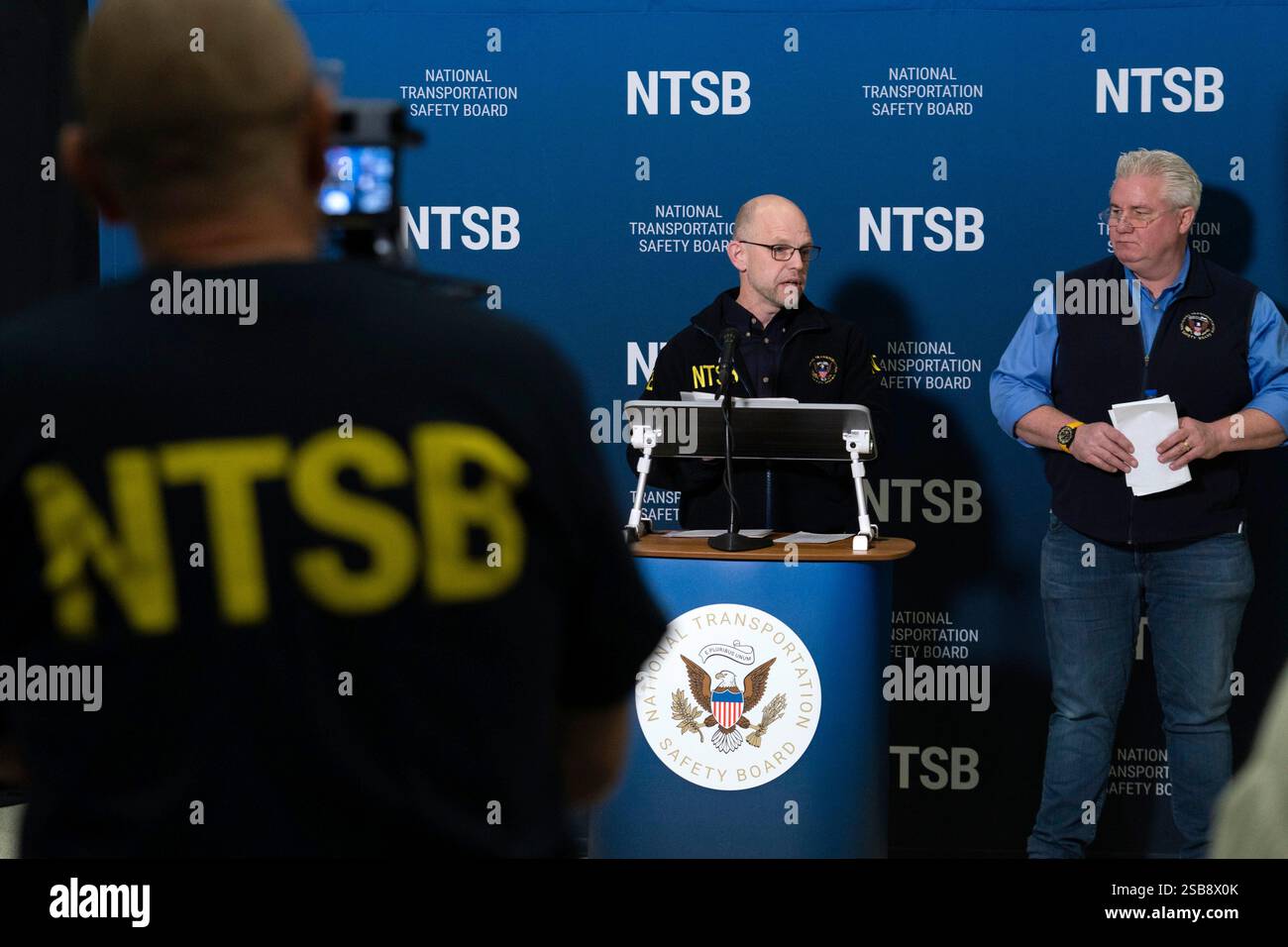 Brice Banning, center, investigator in charge, and National ...