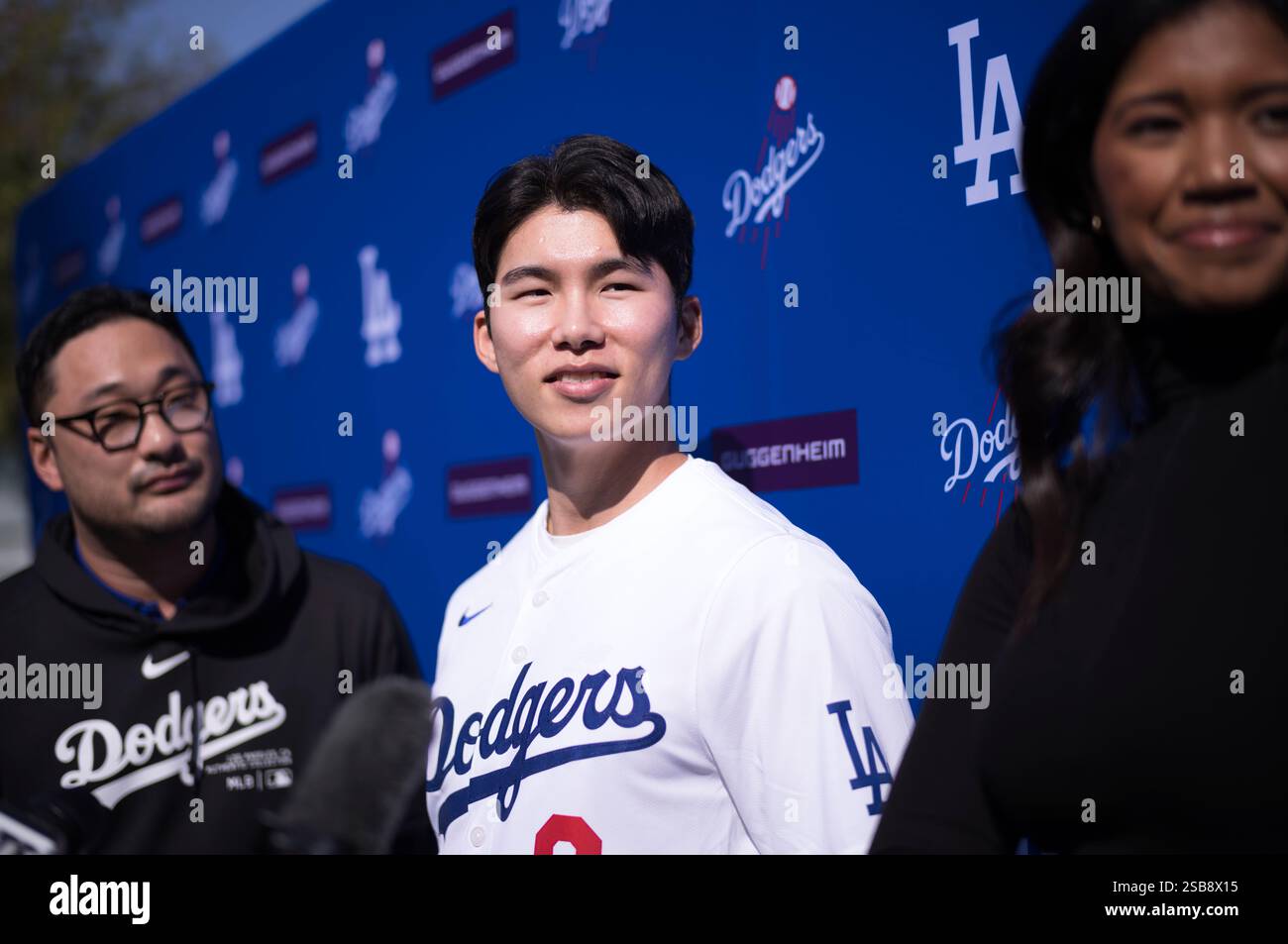 Los Angeles Dodgers' Hyeseong Kim talks with the media during an interview at DodgerFest ...