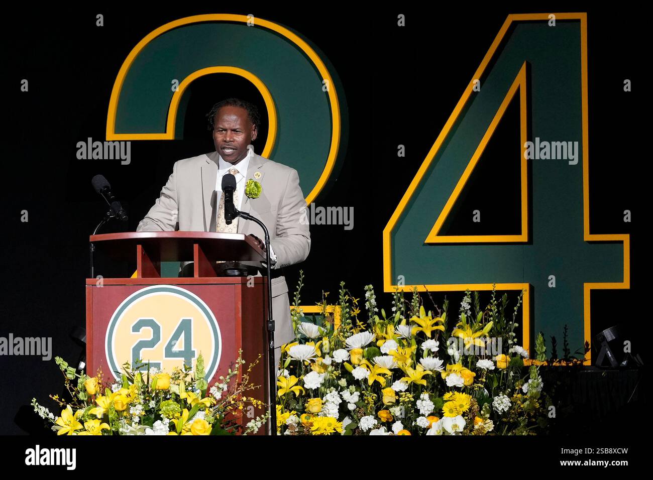 Former baseball player Bip Roberts speaks during a celebration of life ...
