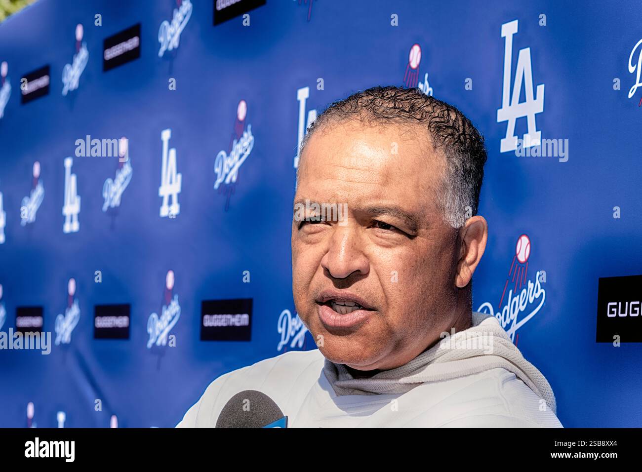 Los Angeles Dodger manager Dave Roberts talks to the media during an ...