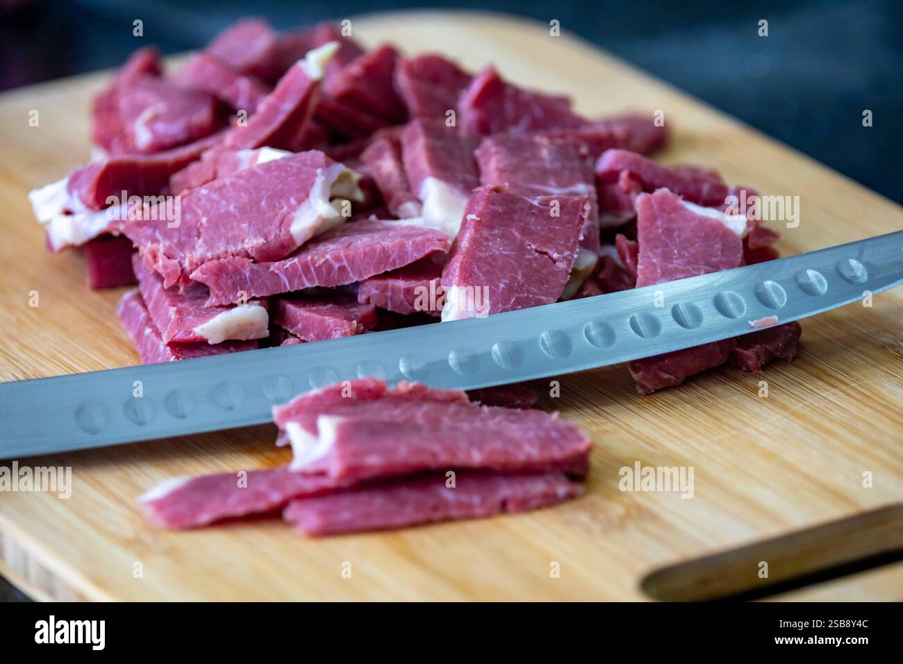 Traditional rustic salted sun-dried meat Stock Photo - Alamy