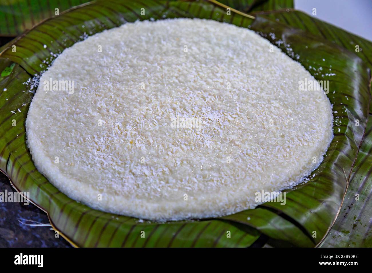 Amazonian coconut tapioca in banana leaf Stock Photo - Alamy
