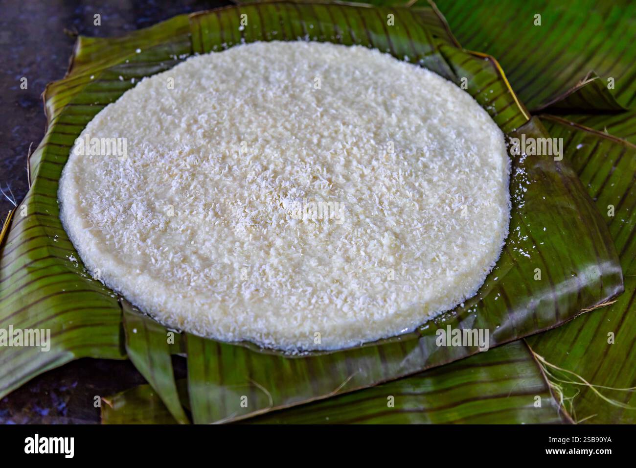 Amazonian coconut tapioca in banana leaf Stock Photo - Alamy