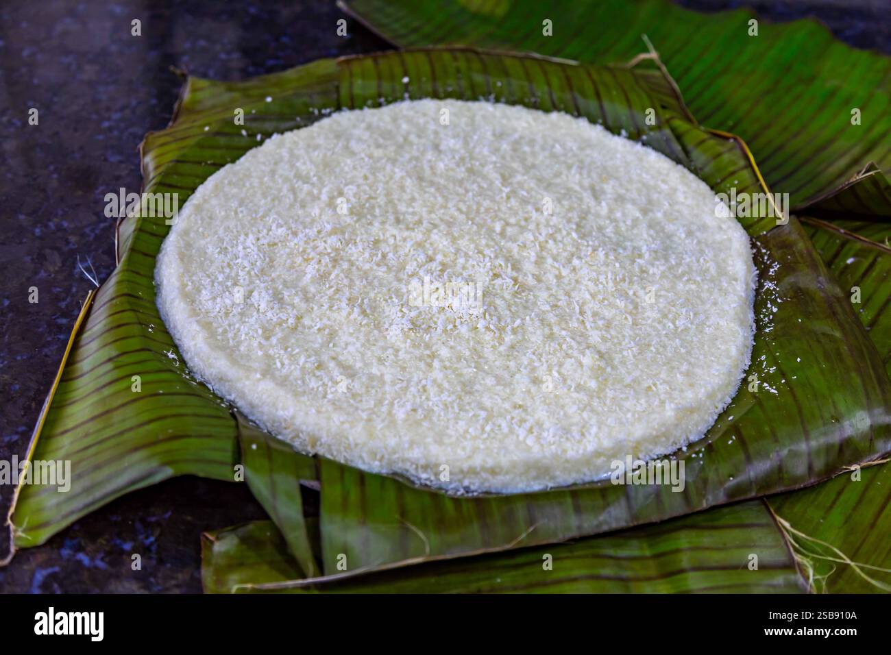 Amazonian coconut tapioca in banana leaf Stock Photo - Alamy