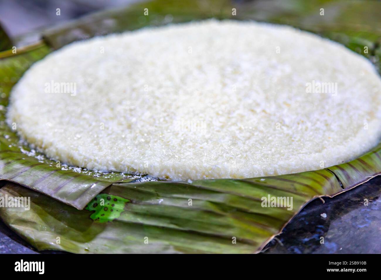 Amazonian coconut tapioca in banana leaf Stock Photo - Alamy