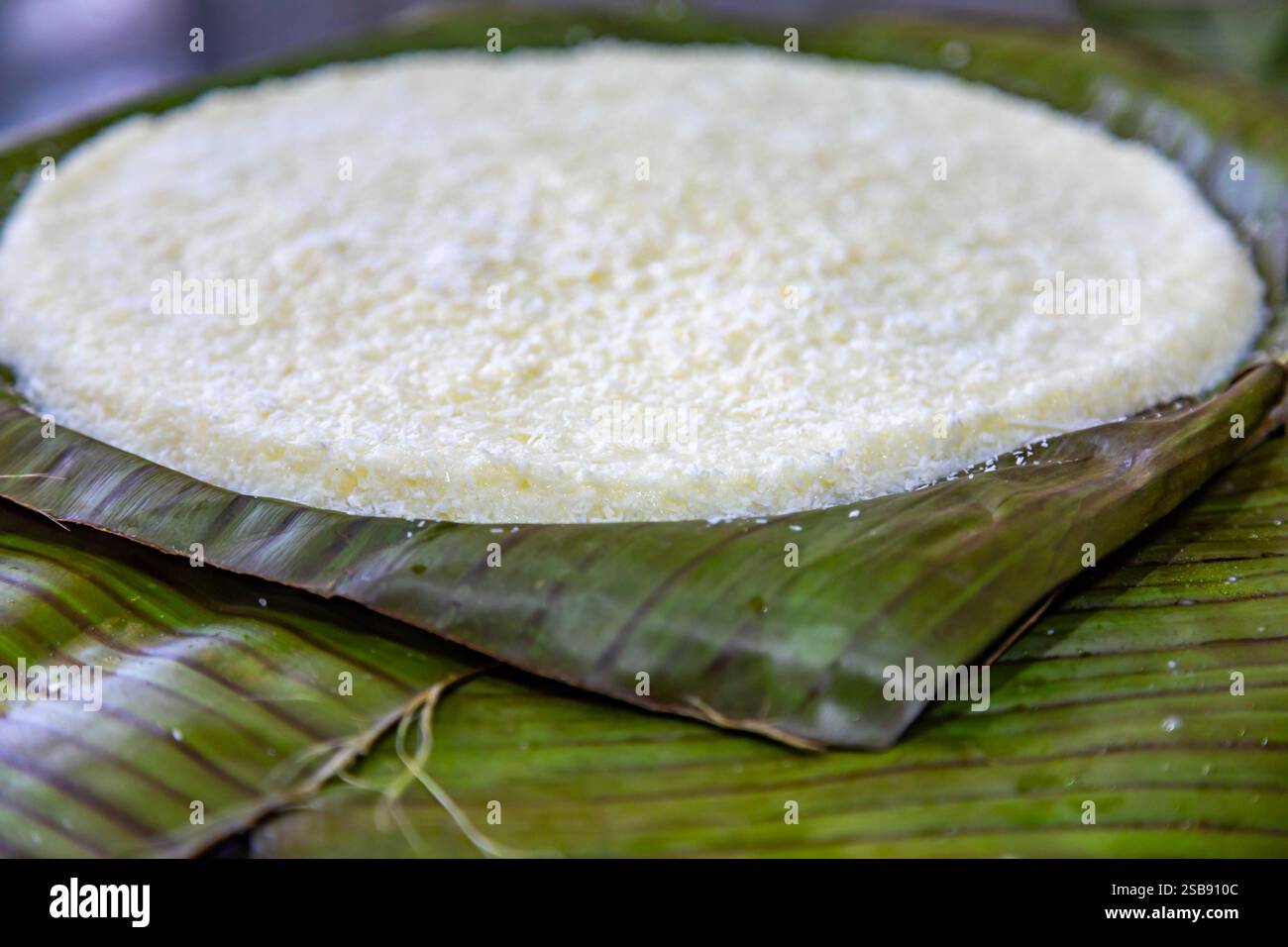 Amazonian coconut tapioca in banana leaf Stock Photo - Alamy