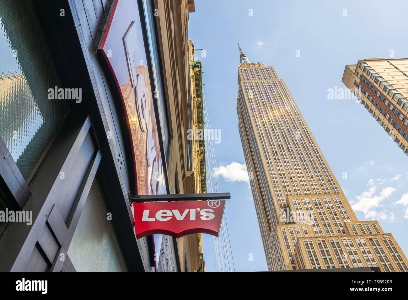 Levi's store sign with Empire State Building towering above against ...