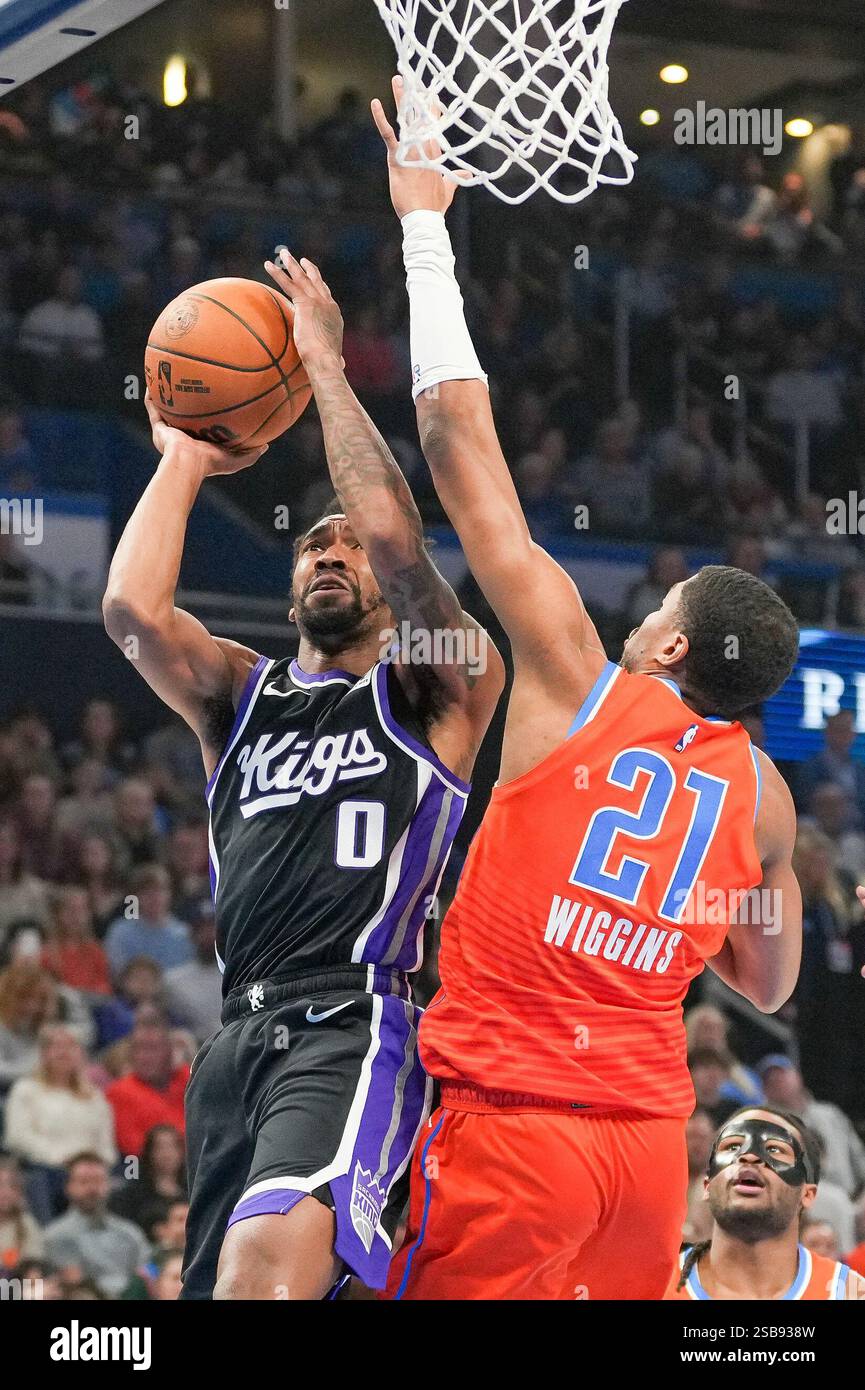 Sacramento Kings guard Malik Monk (0) shoots over Oklahoma City Thunder ...