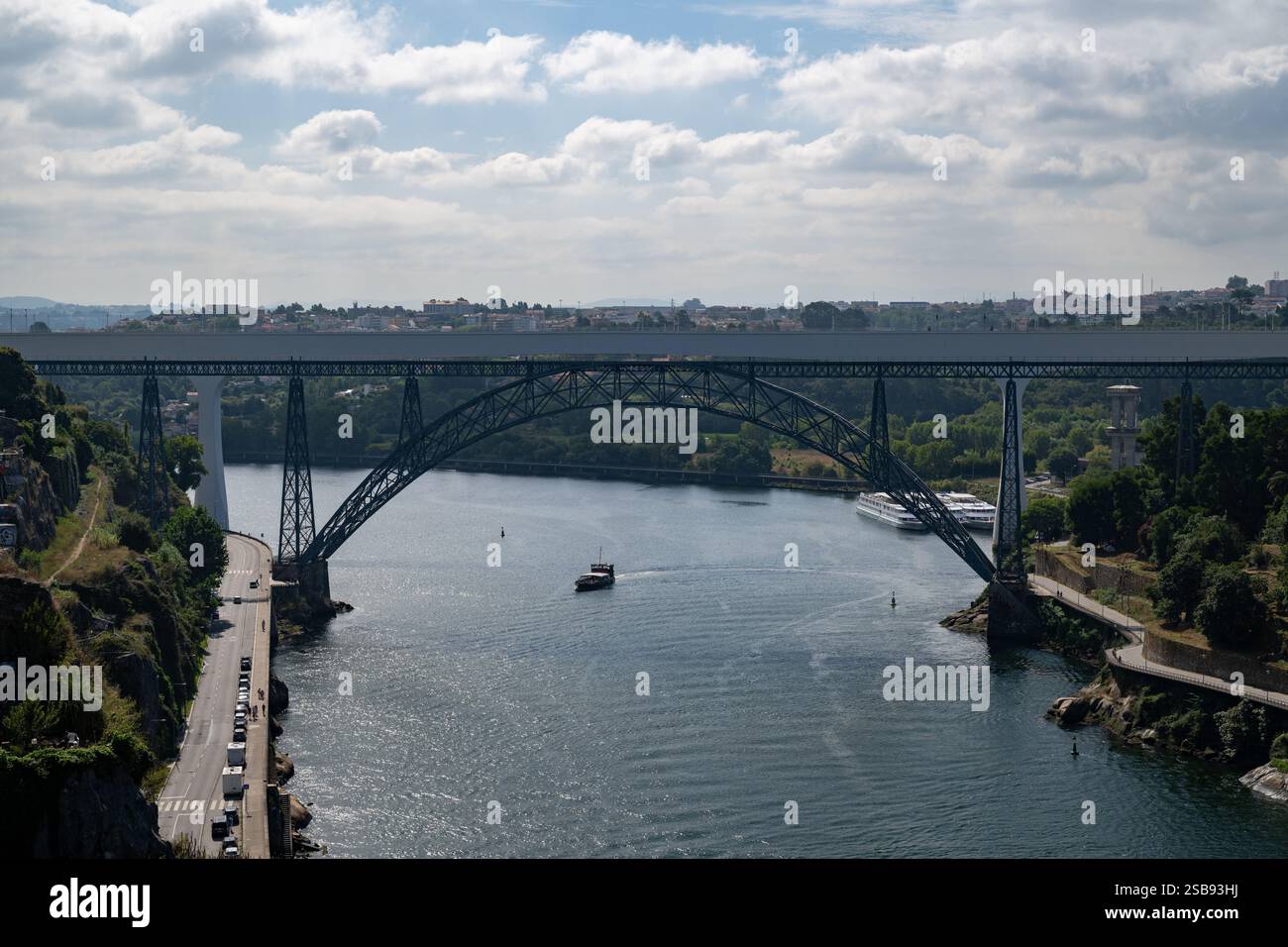 Dona Maria Pia Bridge and Sao Joao Bridge spanning the Douro River ...