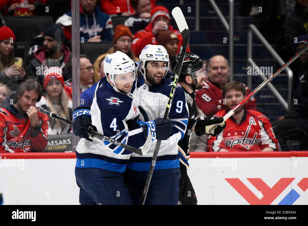 Winnipeg Jets left wing Alex Iafallo (9) celebrates his goal with ...