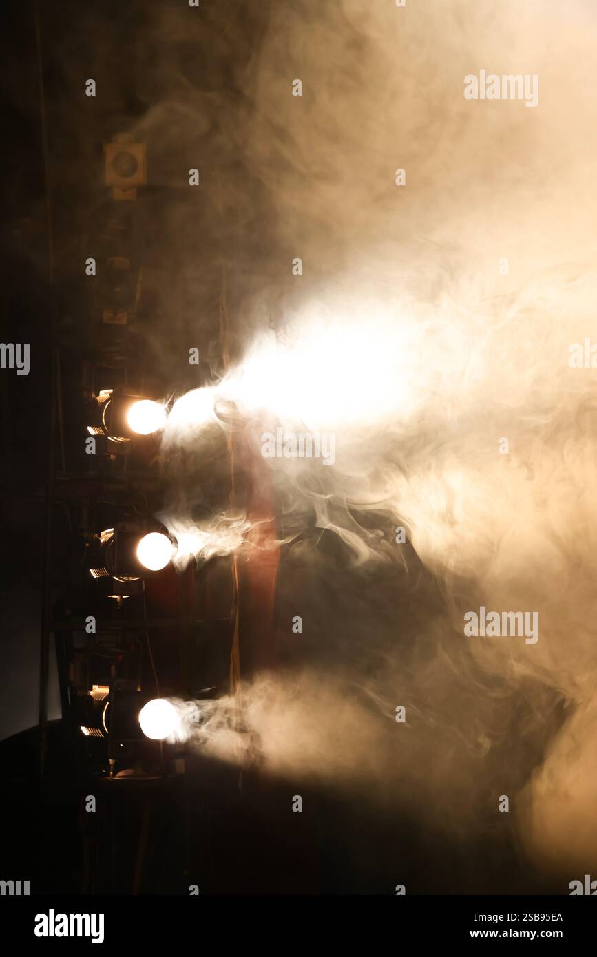 Professional spotlights and smoke on stage in theatre Stock Photo - Alamy
