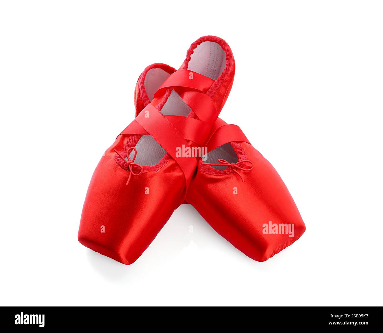 Pair of beautiful red pointe shoes isolated on white Stock Photo - Alamy