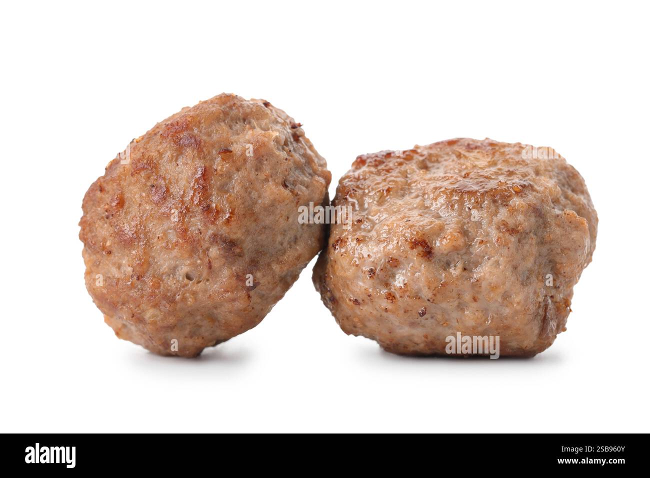 Two tasty cooked meatballs isolated on white Stock Photo - Alamy
