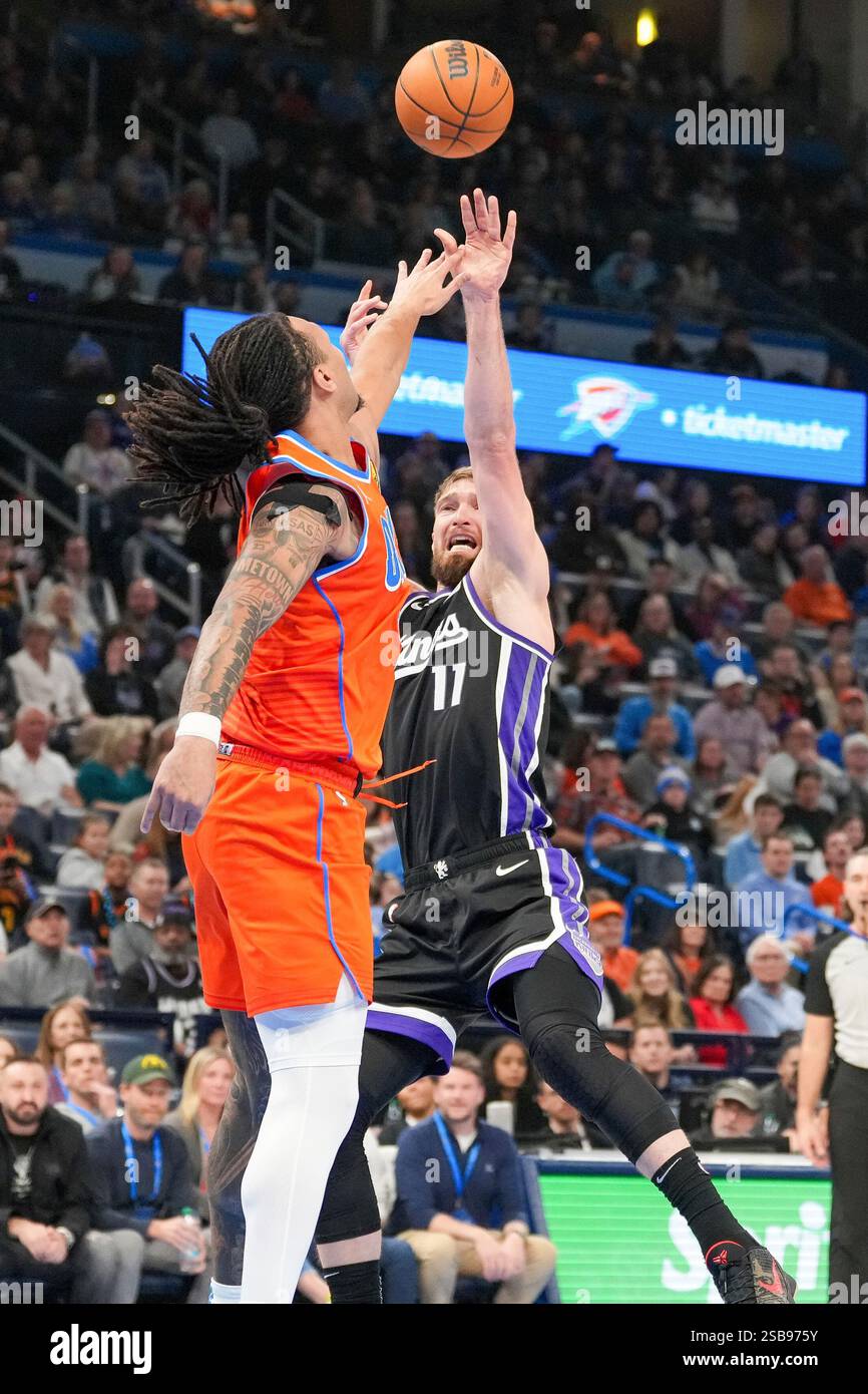 Sacramento Kings forward Domantas Sabonis, right, shoots over Oklahoma ...
