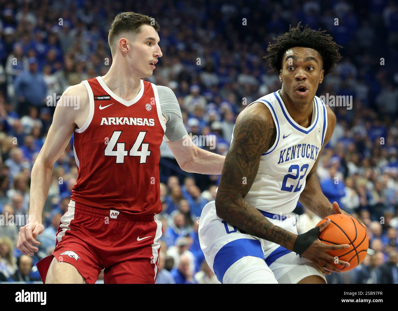 Kentucky's Amari Williams (22) looks for an opening on Arkansas ...