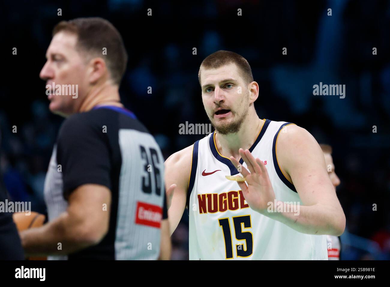 Denver Nuggets center Nikola Jokic (15) pleads with referee Brent ...