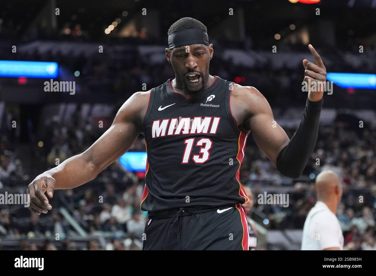 Miami Heat center Bam Adebayo (13) reacts to a play during the first ...