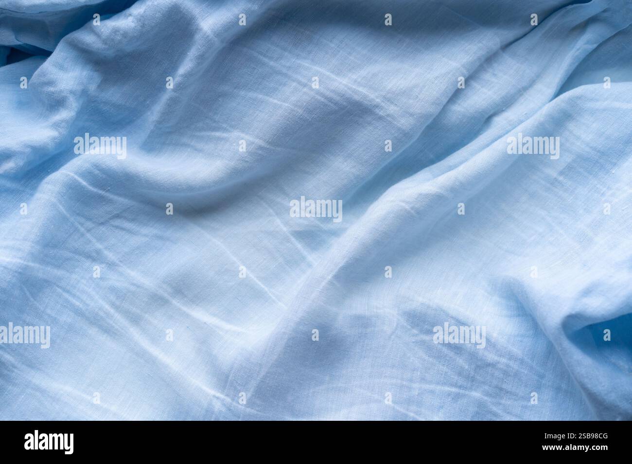 Soft blue linen fabric Stock Photo - Alamy