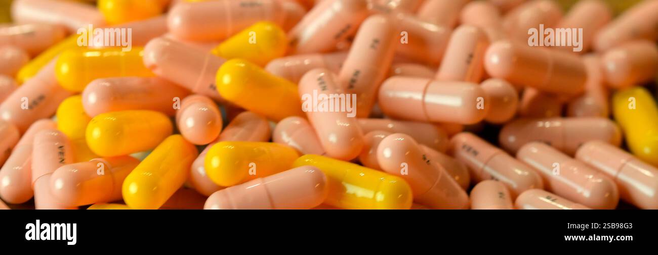 A pile of tablets. Macro image of a heap of pills. Medication in ...