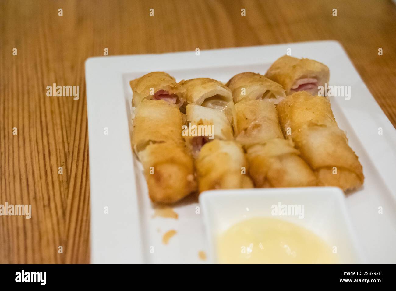 Fried spring roll served on plate, Thai food Stock Photo - Alamy
