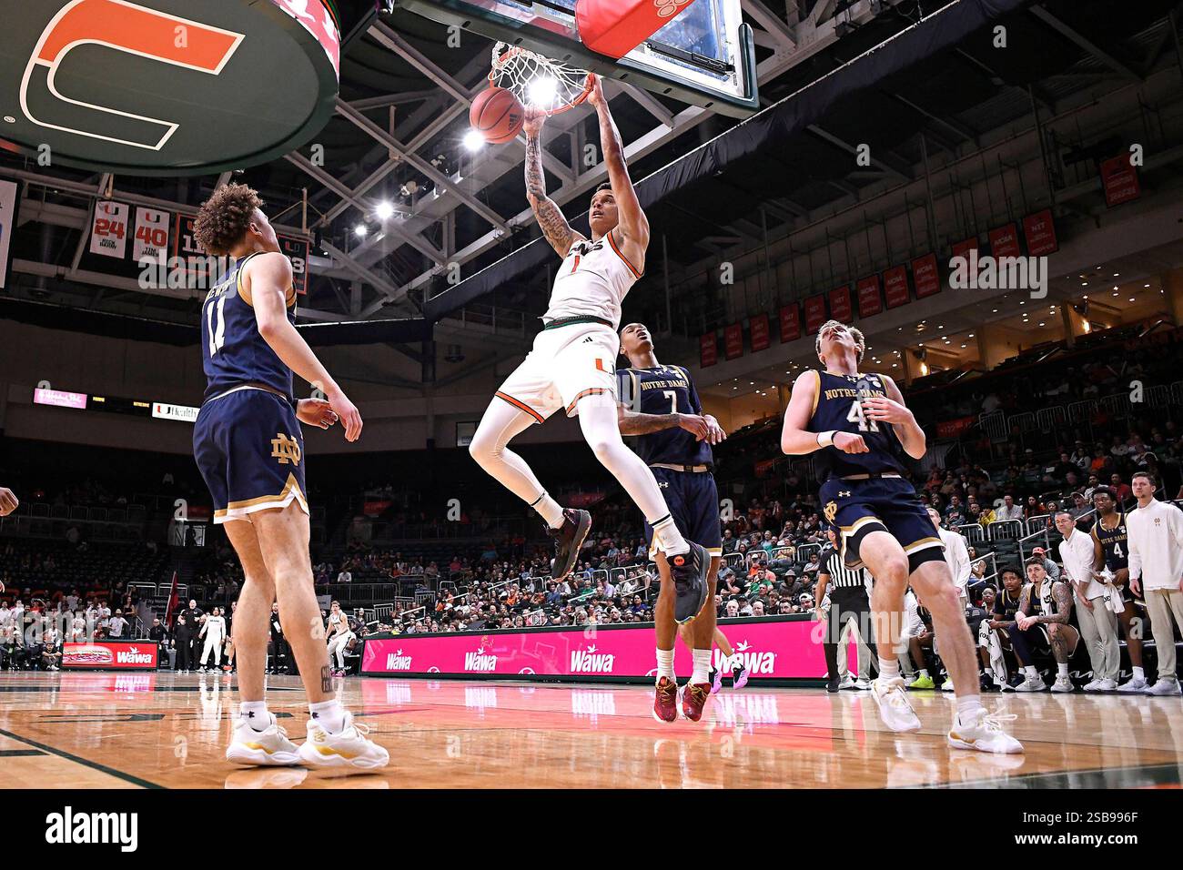 CORAL GABLES, FL - FEBRUARY 01: Miami center Lynn Kidd (1) dunks the ...