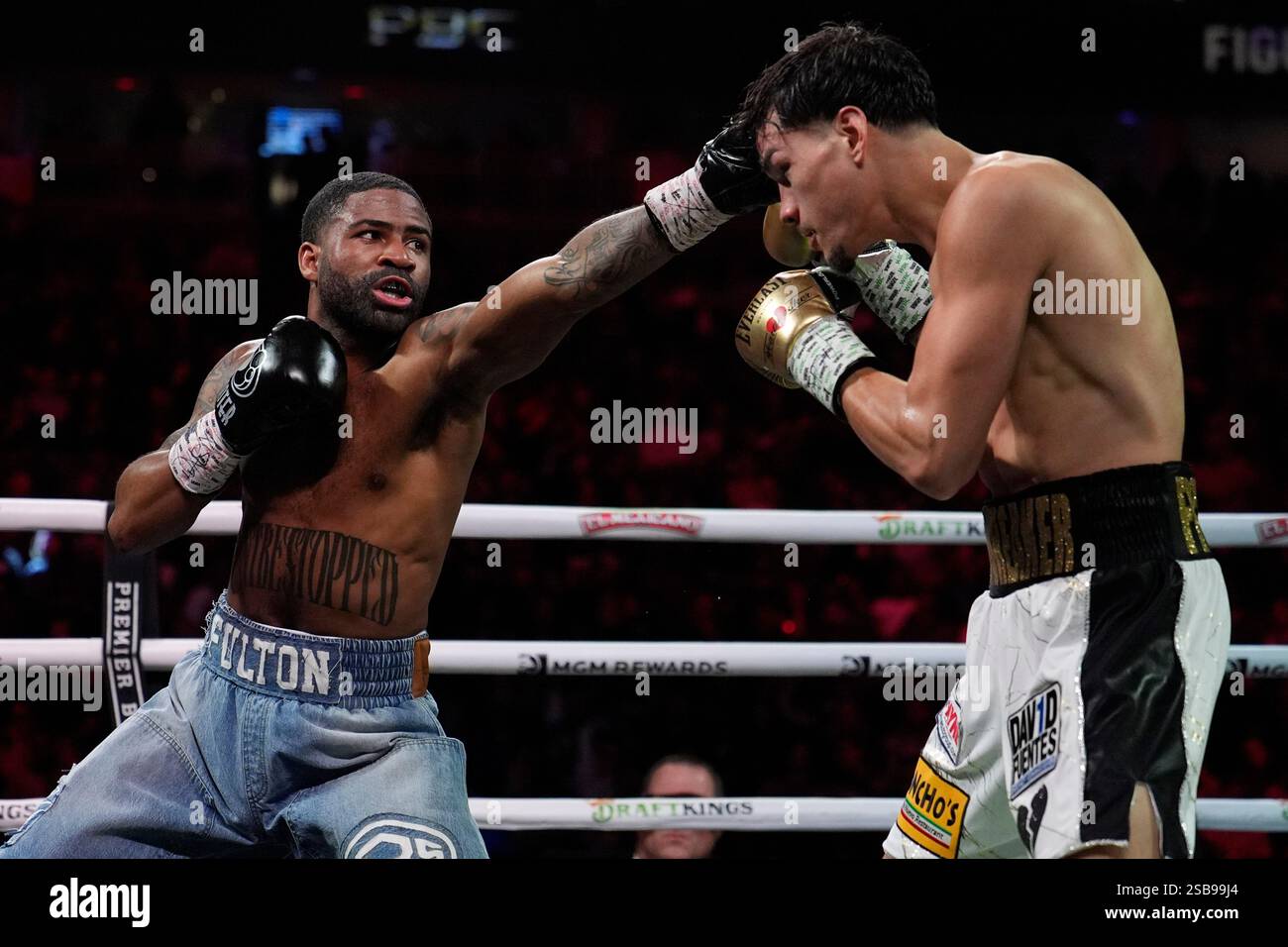 Brandon Figueroa, right, fights Stephen Fulton Jr. in a featherweight ...