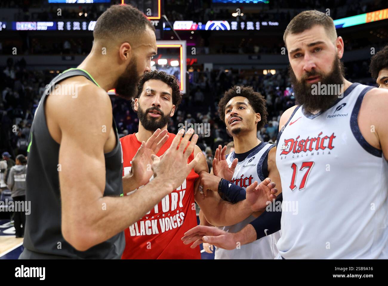 Washington Wizards guard Jordan Poole, second from right, and Minnesota ...