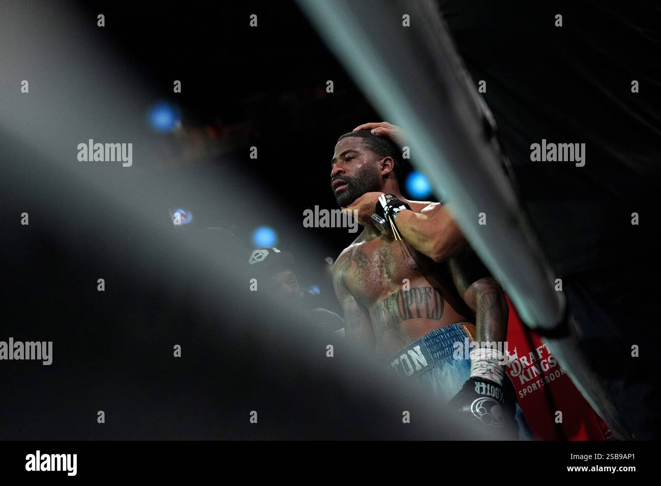 Stephen Fulton Jr. stands in his corner between rounds against Brandon ...