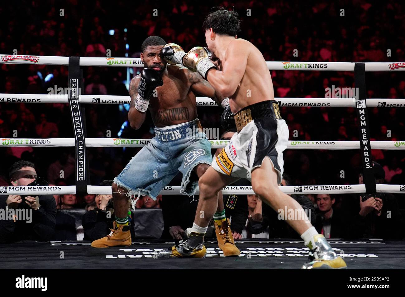 Brandon Figueroa lands a right to Stephen Fulton Jr. in a featherweight ...