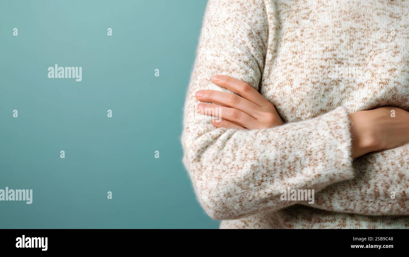 Close-up of a person holding their abdomen in pain,with a visible ...
