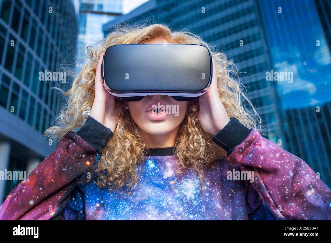 Women in VR glasses of the future Stock Photo - Alamy