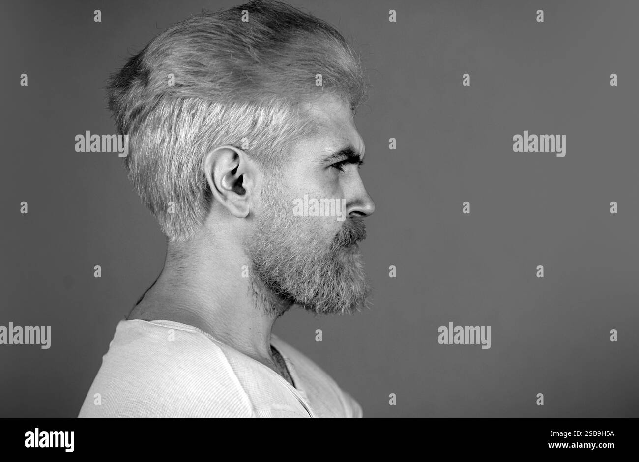Half-turned side profile close up view portrait of confident serious ...