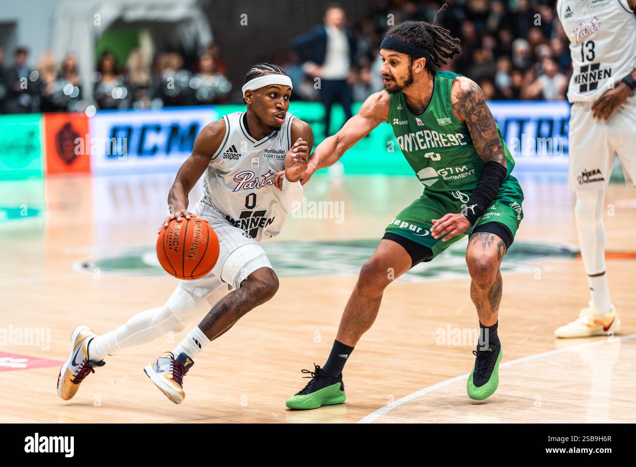 TJ SHORTS of Paris Basketball and Benjamin SENE of Nanterre 92 during ...