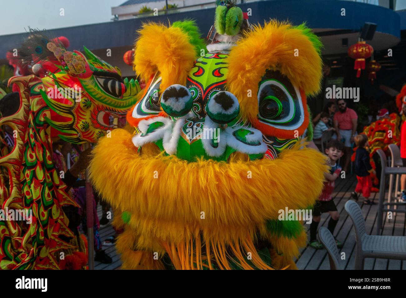 Dragon dancing & lion dancing simultaneously at a skybar for Chinese ...