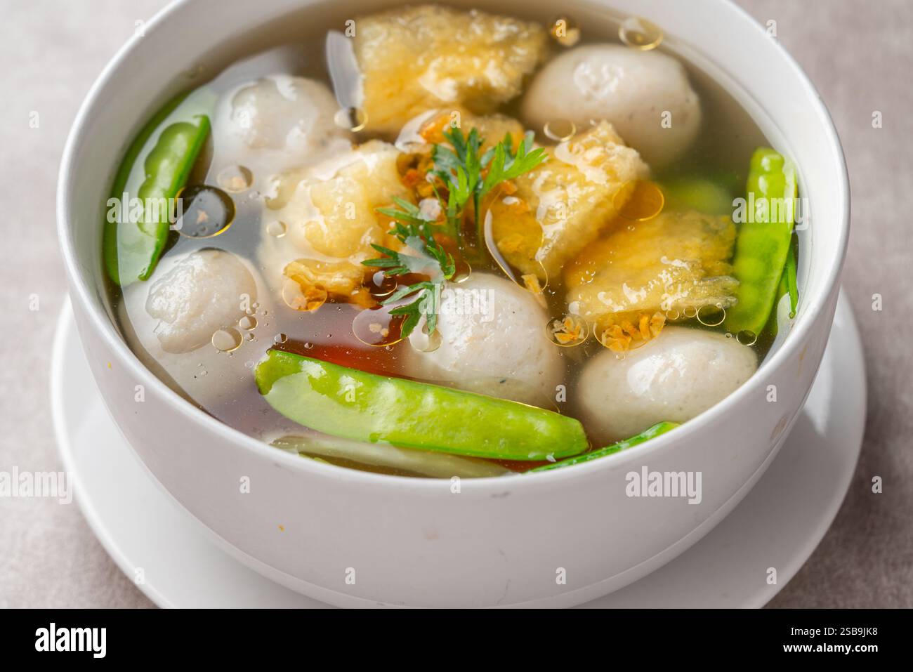 Fish Ball Soup with Fish belly crackers are called hipio Stock Photo ...