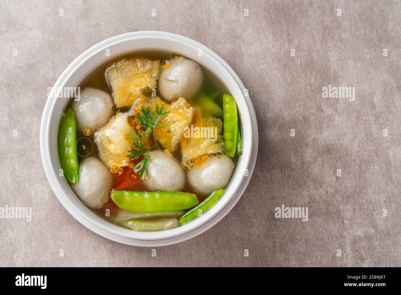Fish Ball Soup with Fish belly crackers are called hipio Stock Photo ...