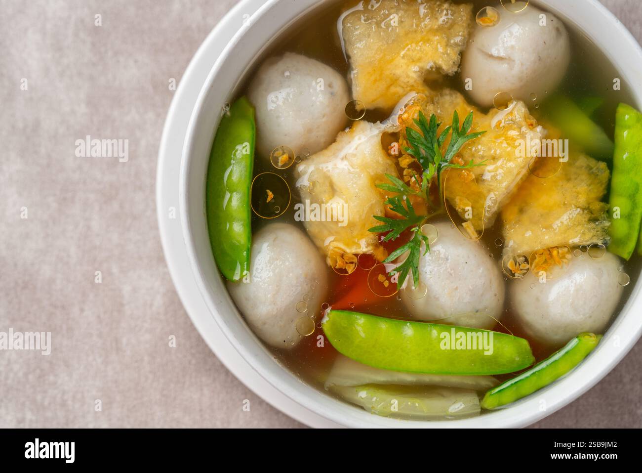 Fish Ball Soup with Fish belly crackers are called hipio Stock Photo ...