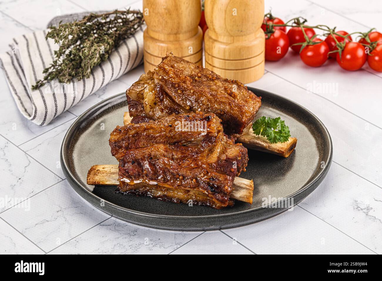Baked beef ribs with marinade with seasoning Stock Photo - Alamy