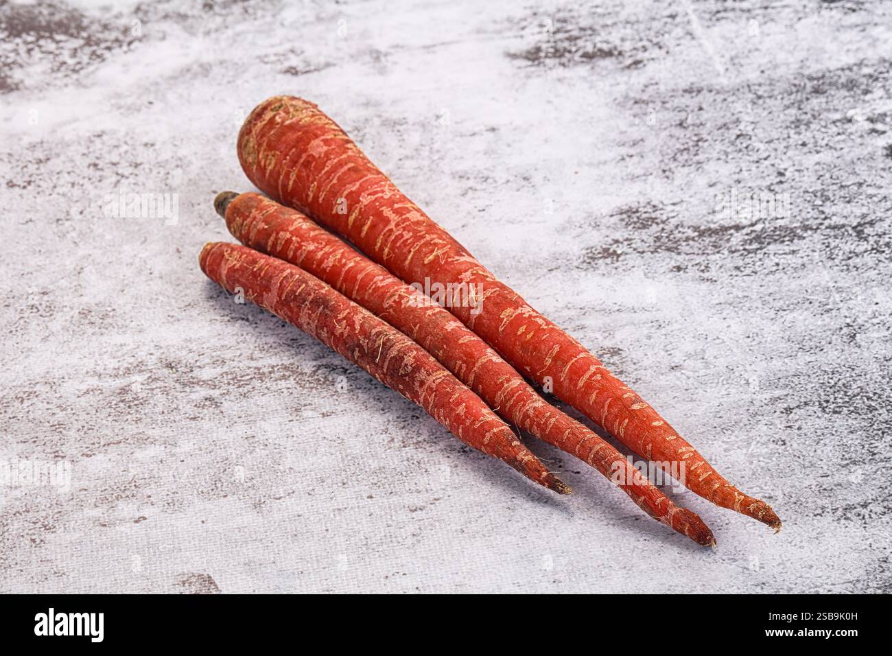 Red Indian raw carrot vegetable root Stock Photo - Alamy