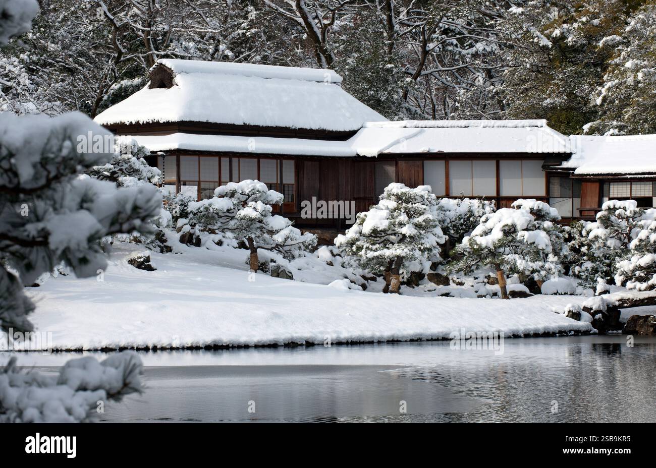 Snowy winter scene at Hikone Castle Genkyuen landscape garden in Hikone ...